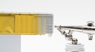 Paint yellow boxcars - Trains