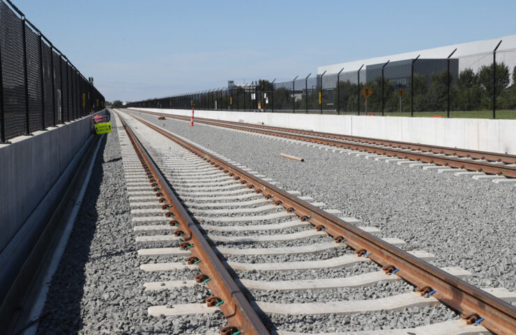 Why do some railroads use concrete ties versus wood ties? - Trains