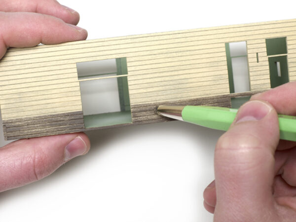 Model a weather-beaten wood structure - Trains