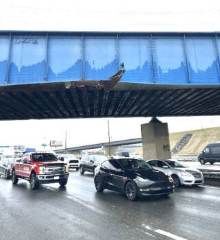 Philadelphia railroad bridge struck by oversized load, closing I-95 ...