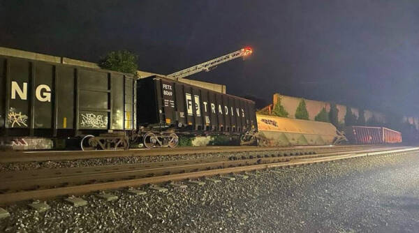 CSX train derails, damaging garages at residential complex (updated ...