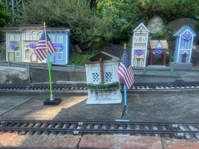 Patriotic parade on Main Street - Trains