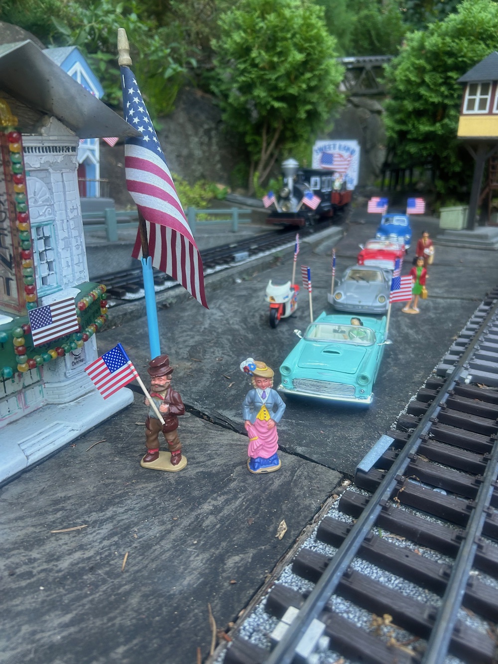 Patriotic parade on Main Street - Trains